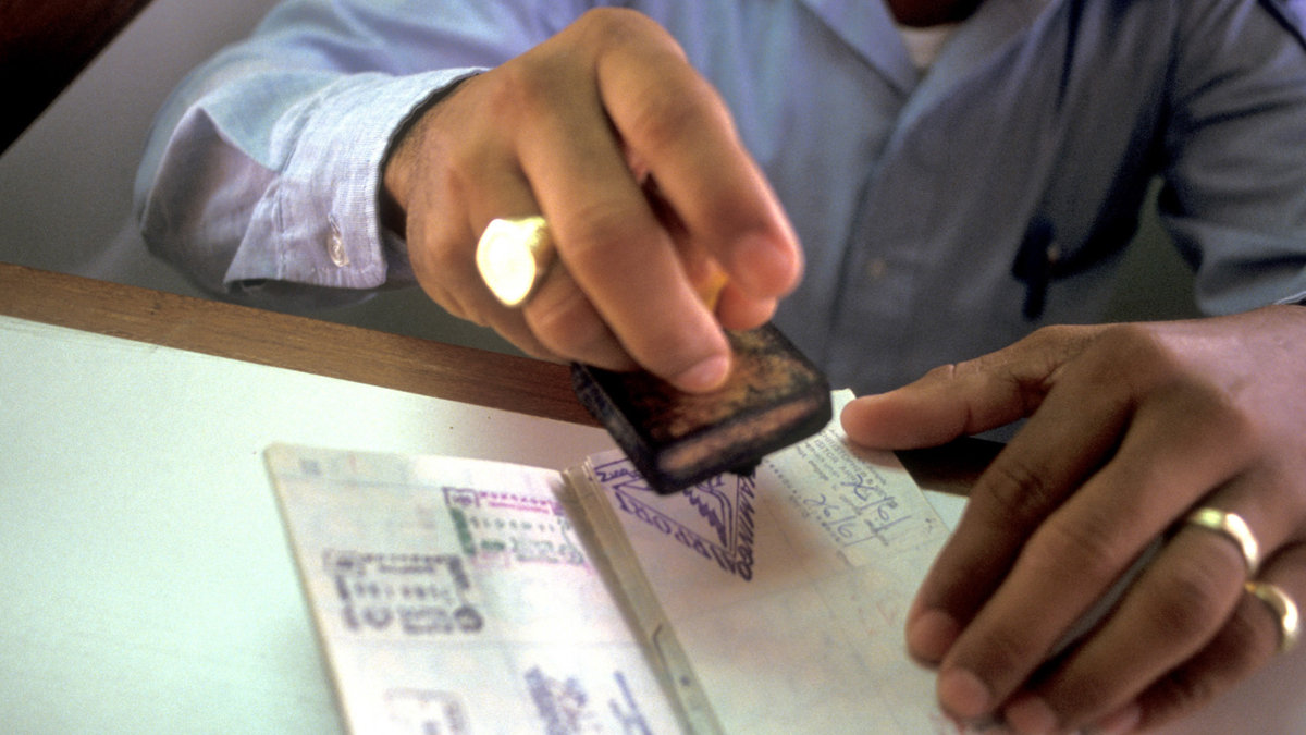 At the Airport Immigration Counter